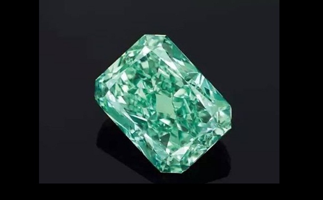 The “Aurora Green”, a Unique Fancy Vivid Green Diamond